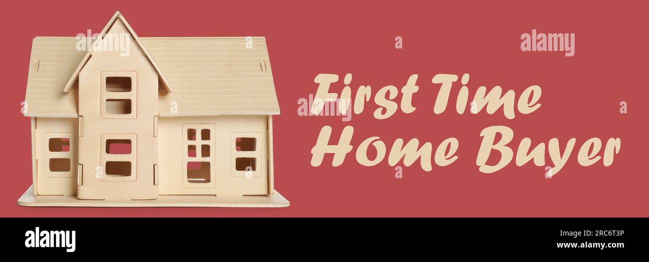 First time home buyer. Wooden house model on red background. Banner ...