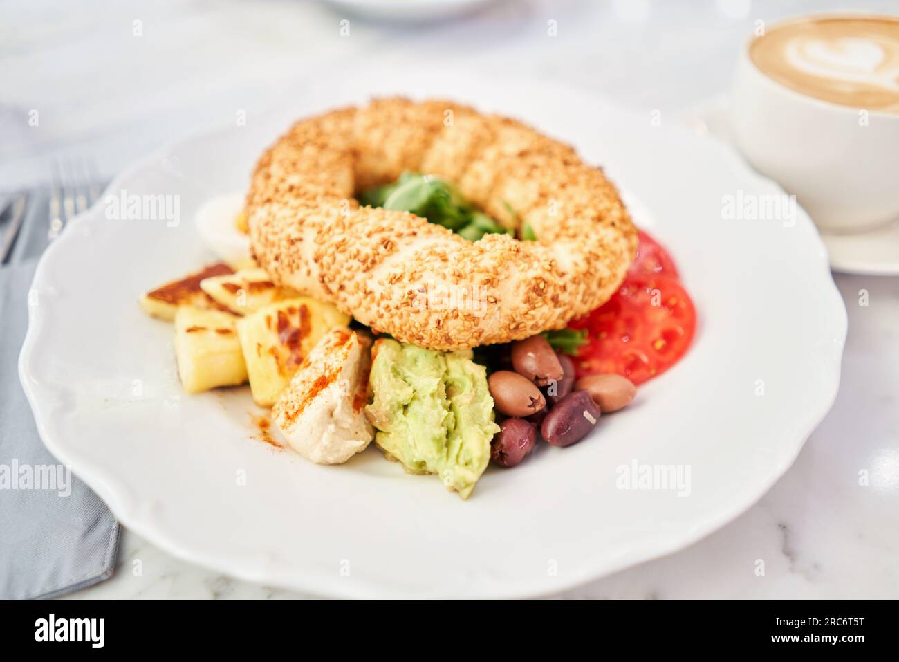 Turkish breakfast with simit, cheese, tomato, cucumber, olives ...