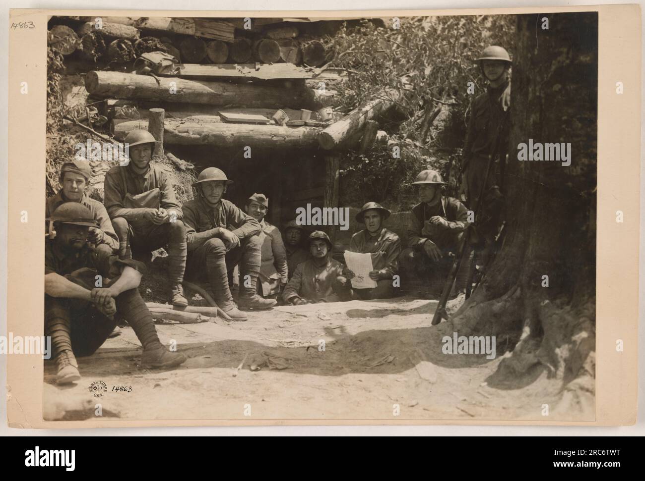Soldiers unloading supplies from a transport ship onto docks during ...