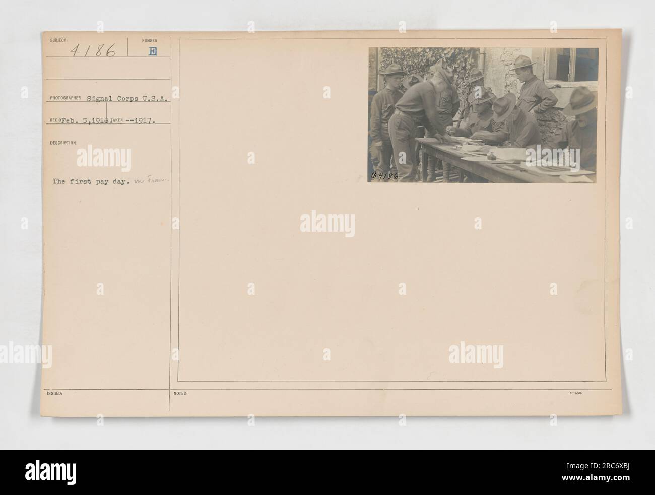 Soldiers receiving their first pay day in France during World War One ...