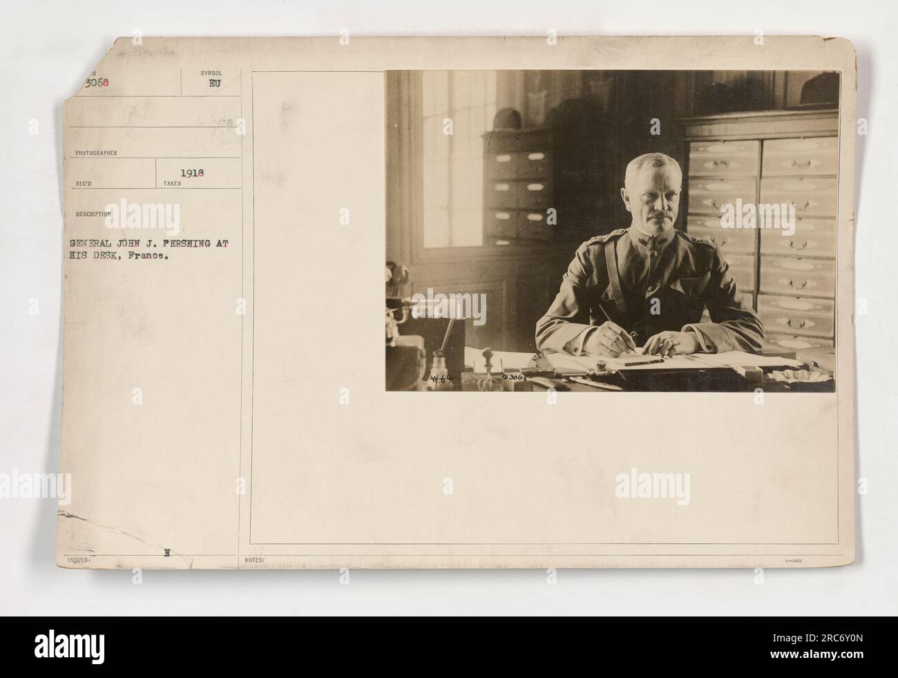 General John J. Pershing seated at his desk in France during World War ...