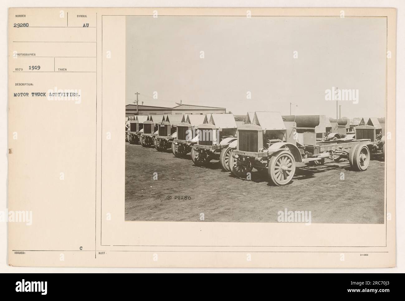 American soldiers using a motor truck for military activities during ...