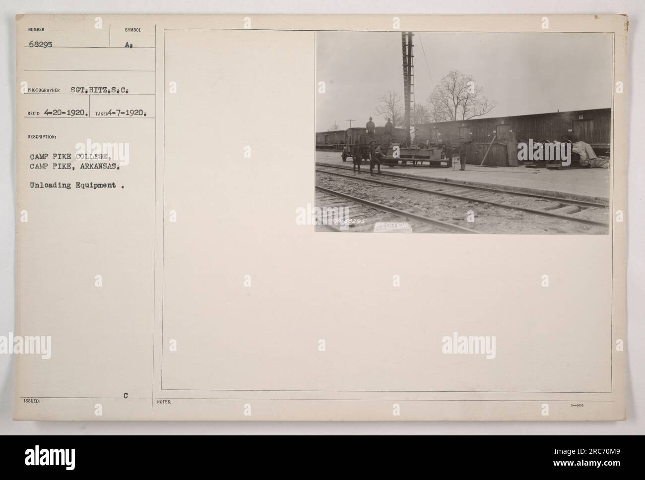 Soldiers at Camp Pike in Arkansas unloading equipment. This photograph ...