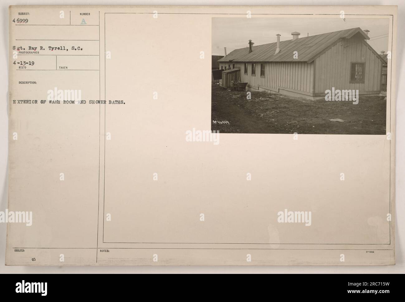 The photograph shows the exterior of the wash room and shower baths ...