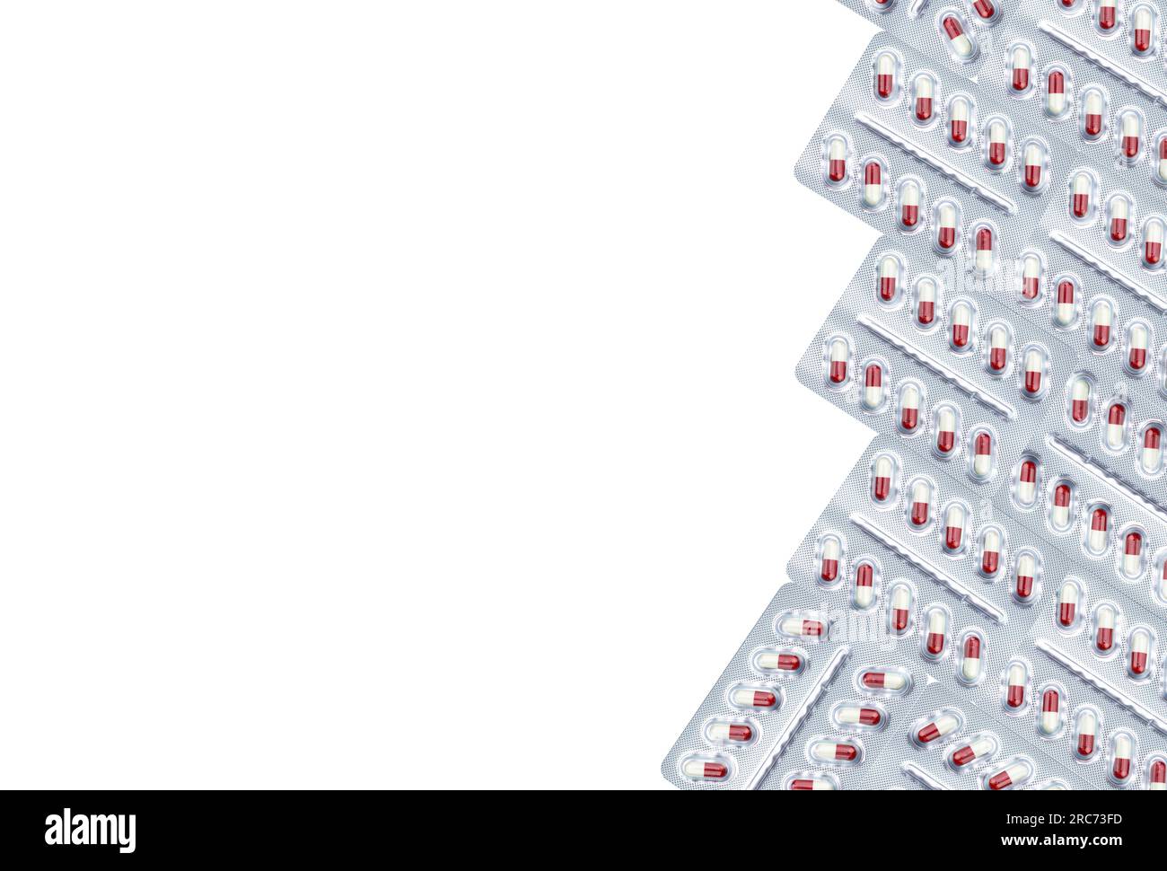 White-red capsule pill in blister pack isolated on white background ...