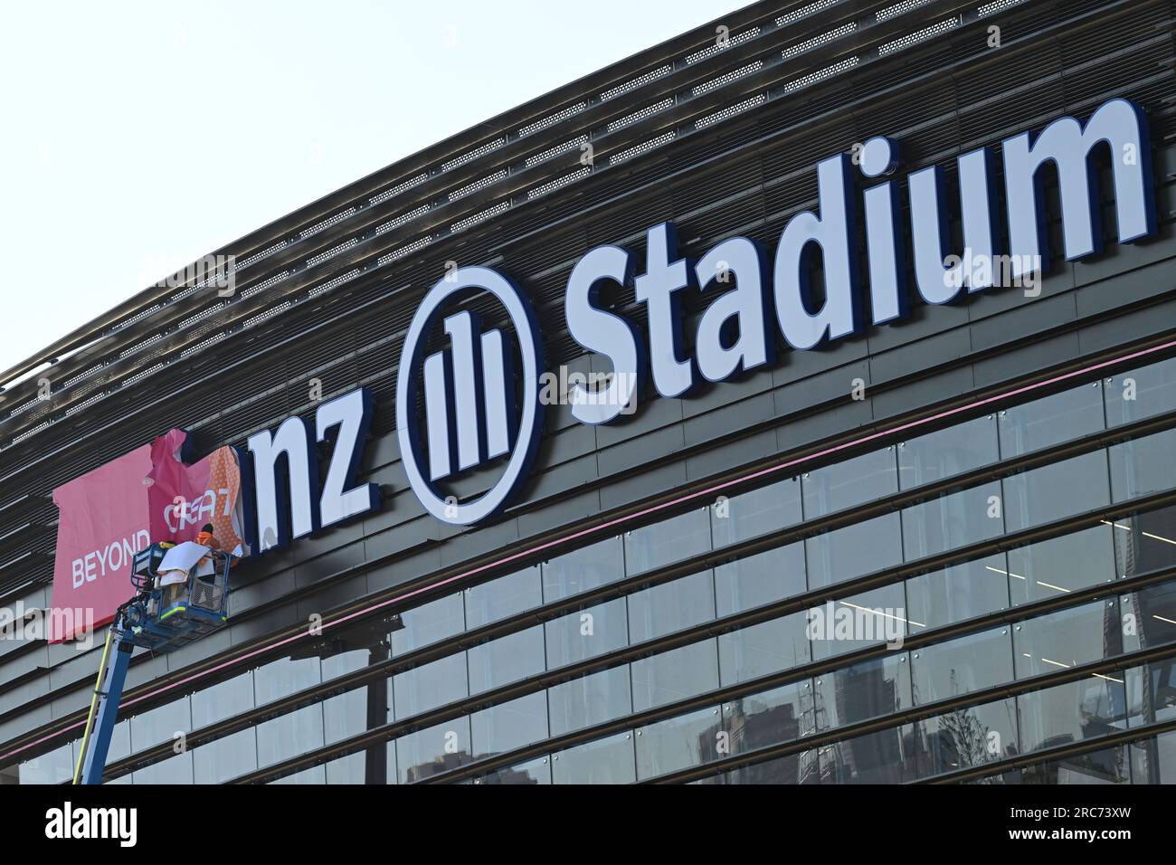 Sydney, Australia. 13th July, 2023. Workers cover up the Allianz ...