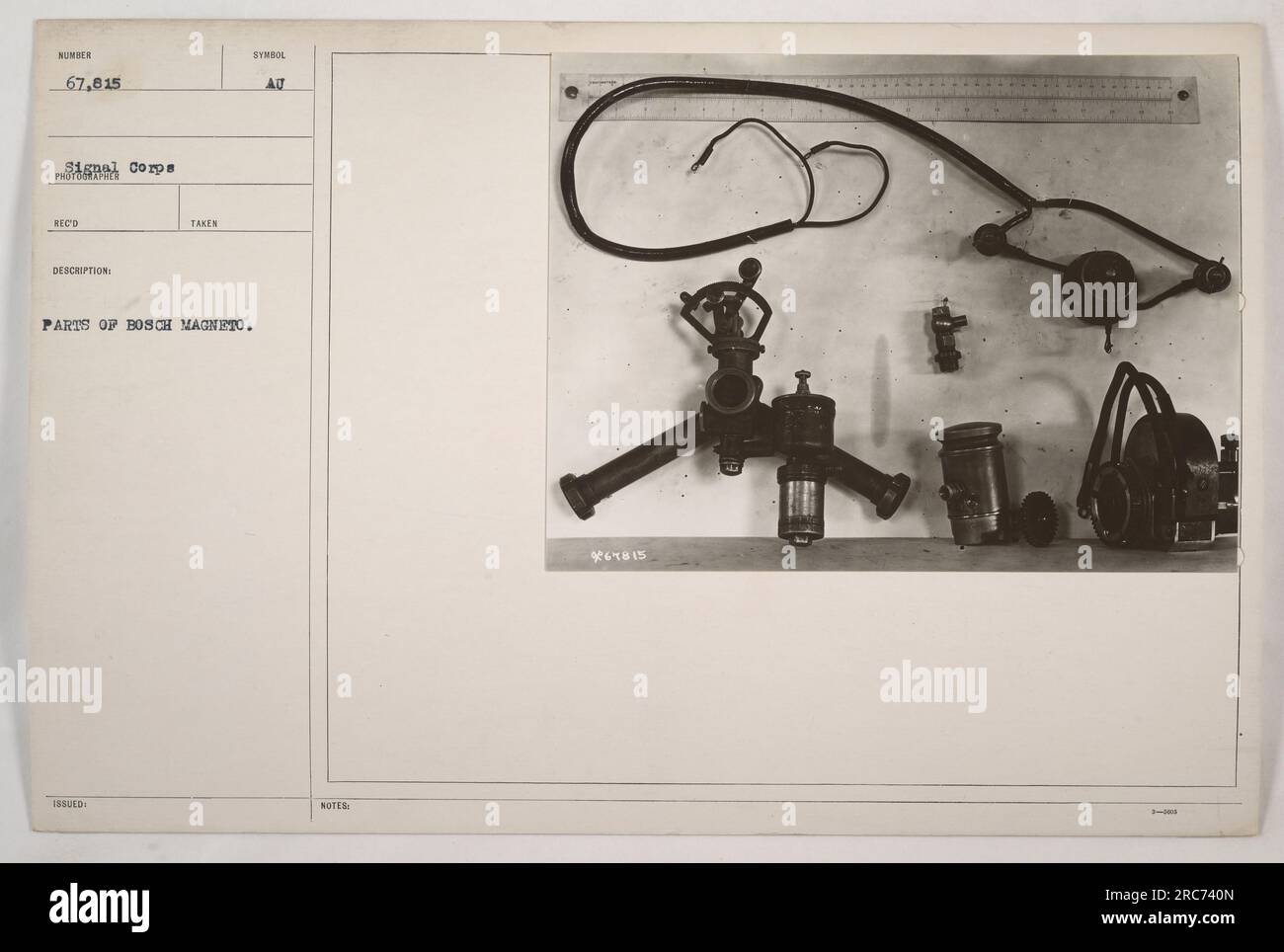 A close-up photograph showing the constituent parts of a Bosch magneto ...