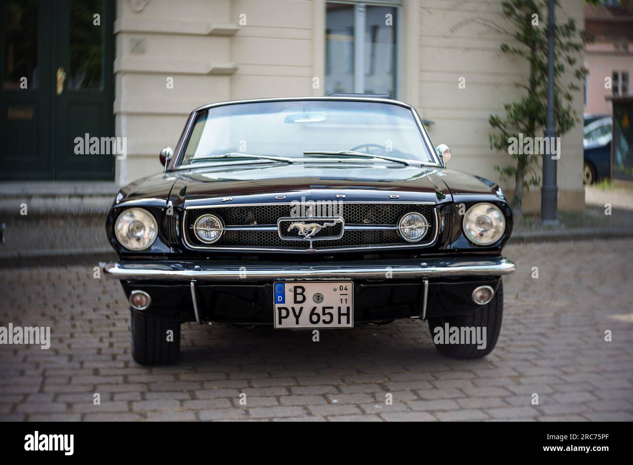 WERDER (HAVEL), GERMANY - MAY 20, 2023: The muscle car Ford Mustang Convertible, 1965. Swirl ...