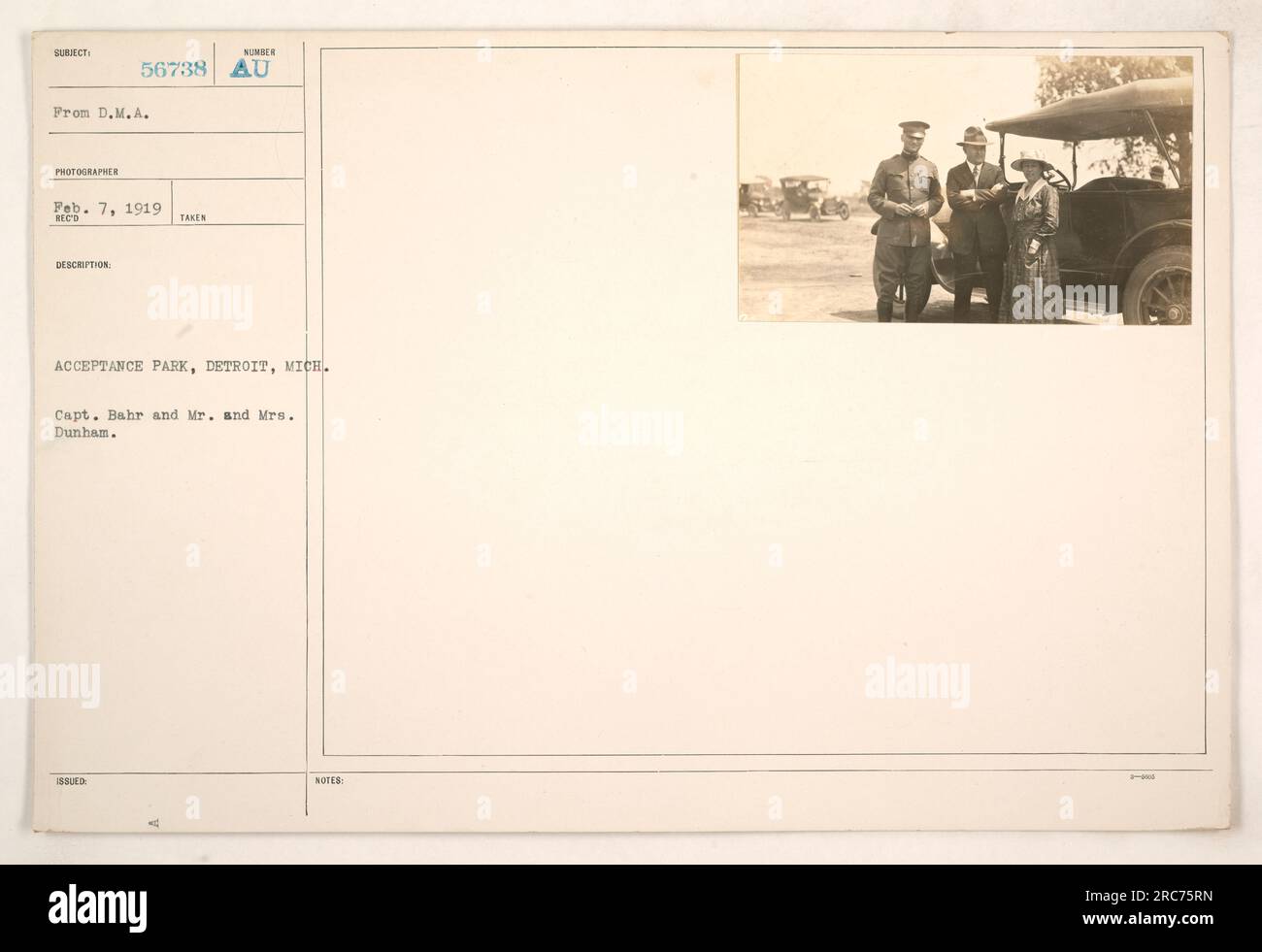 Caption: Captain Bahr of the American military is seen with Mr. and Mrs ...