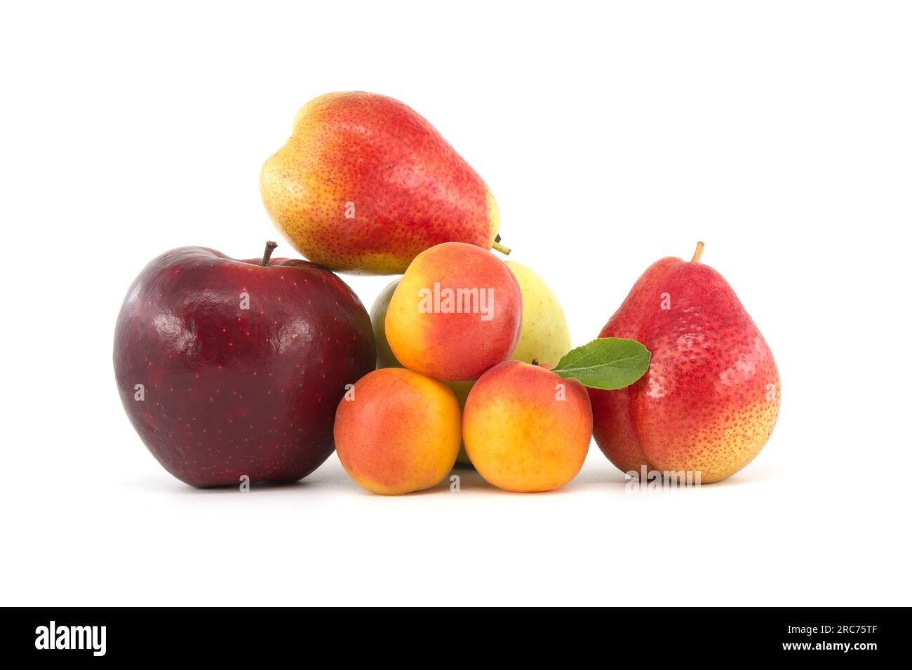 Whole ripe apricots, multicolored pear, red and green apples isolated ...