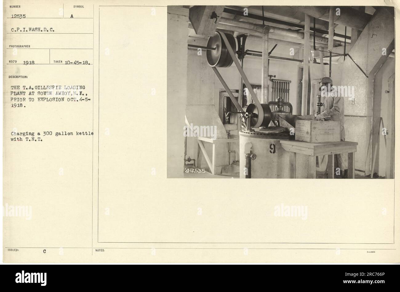 Soldiers loading a 300 gallon kettle with T.N.T. at the T.A. Gillespie ...