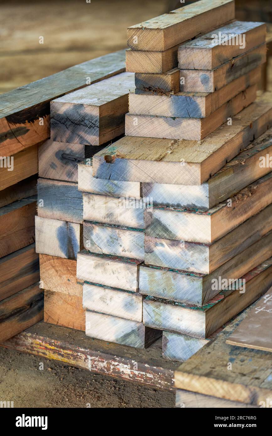 Raw materials of wooden strips arranged neatly in the furniture ...