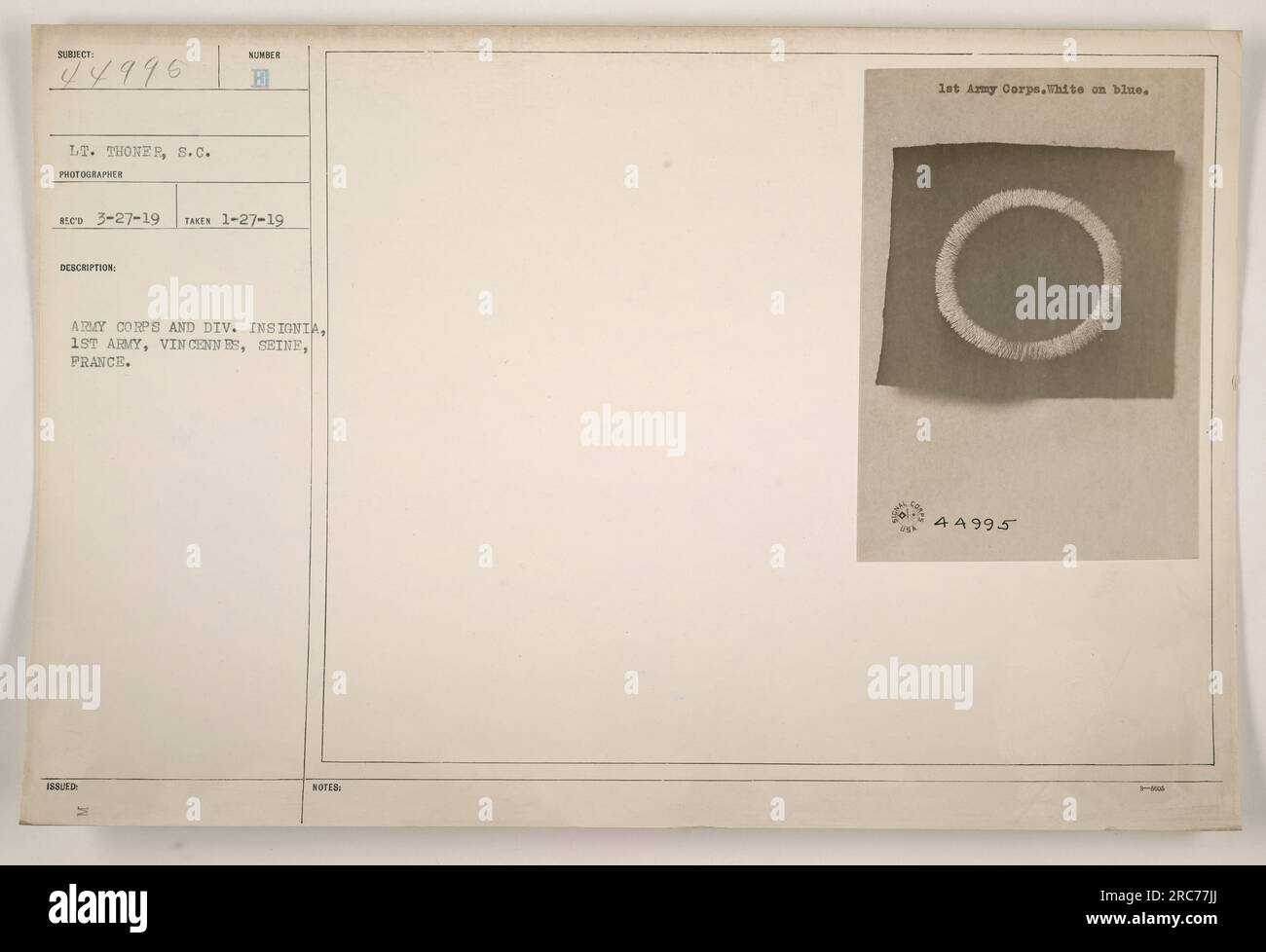 Image of Lt. Thoner standing in front of the Army Corps and Division ...