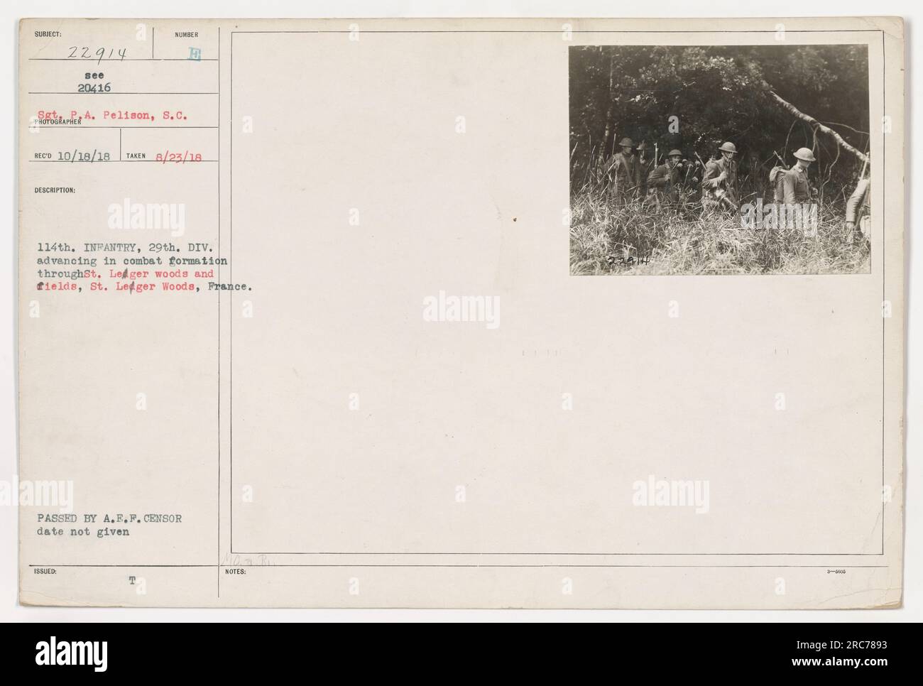 This photograph shows the 114th Infantry of the 29th Division advancing ...