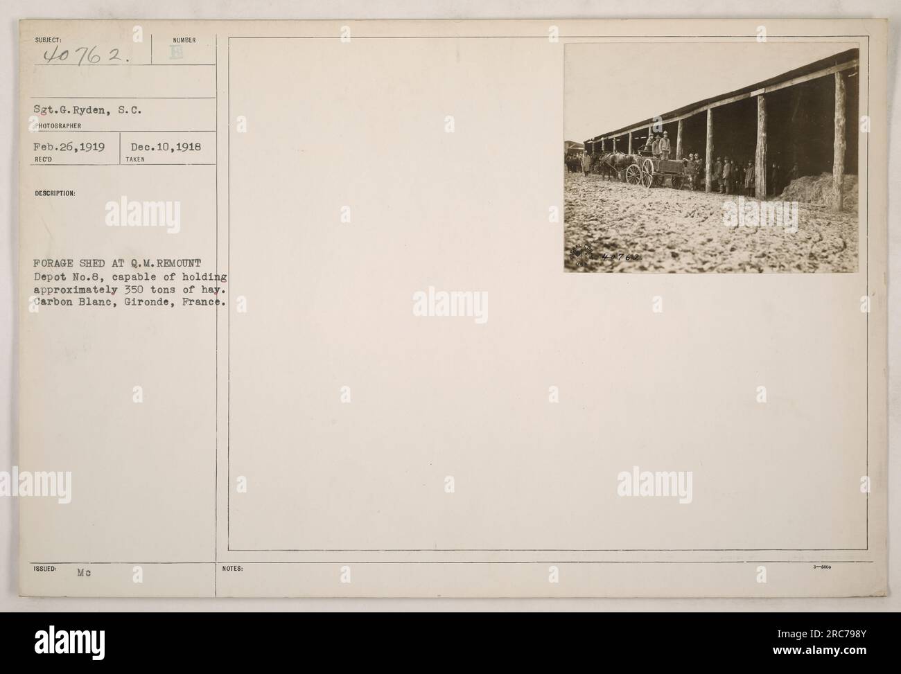 Sgt. G. Ryden is featured taking a photograph of a forage shed at the Q ...