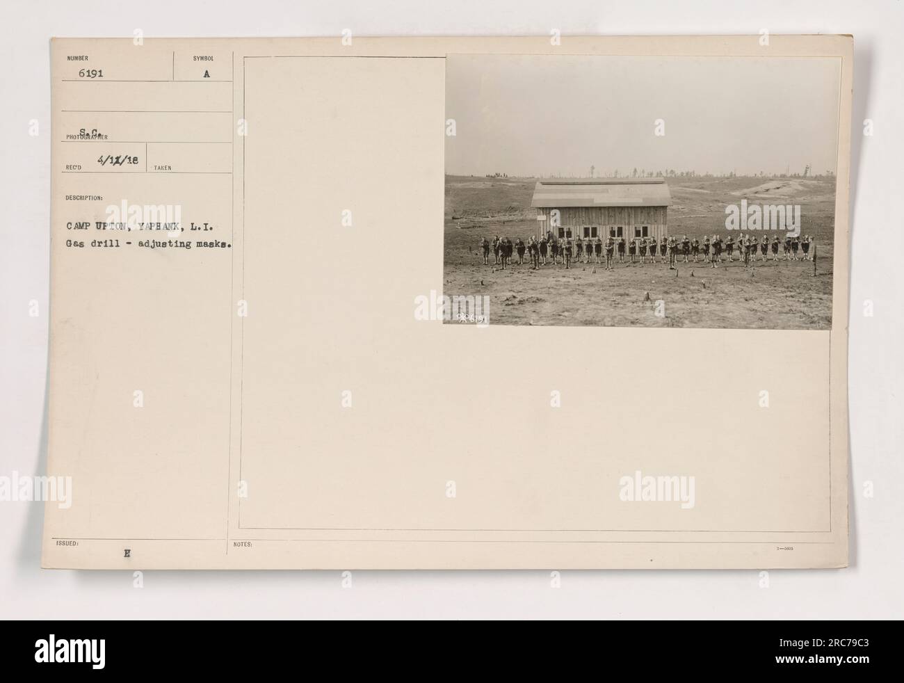 Soldiers at Camp Upton, Long Island participating in a gas mask drill ...