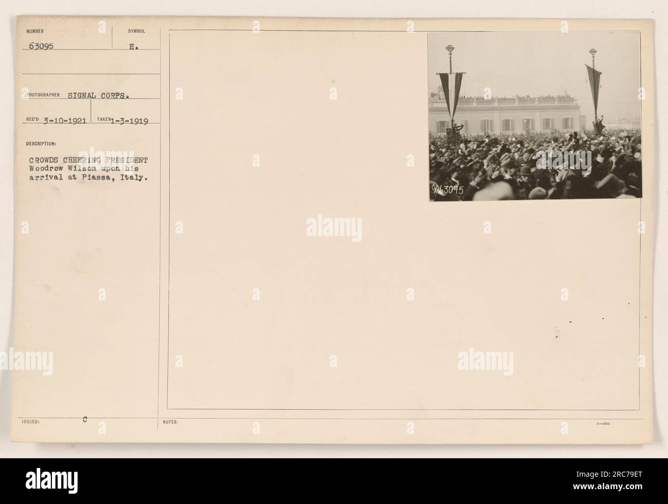 President Woodrow Wilson being cheered by a crowd upon his arrival at ...