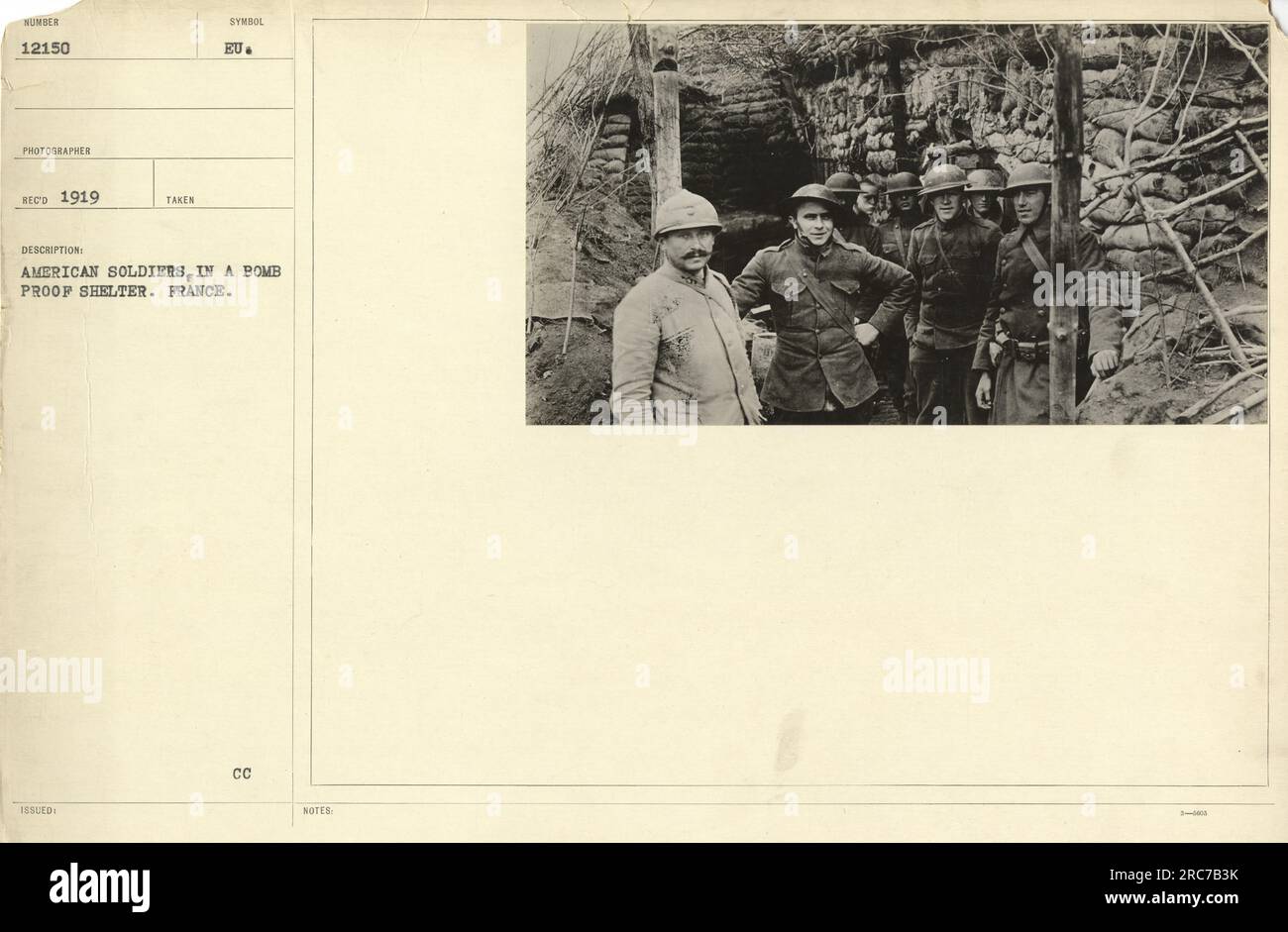 American soldiers seek refuge in a bomb-proof shelter in France during ...