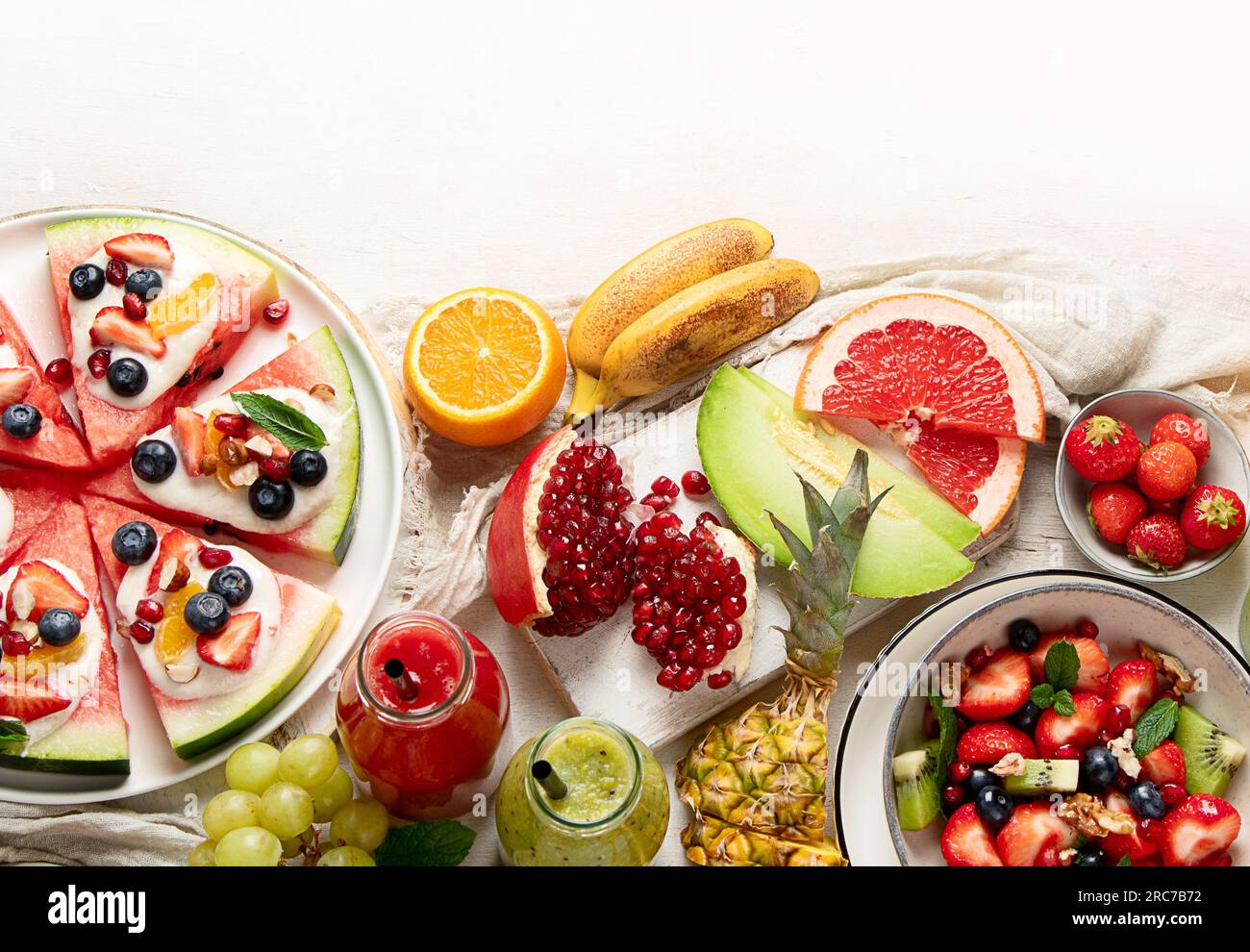 Summer fruits assorted on white background. Fresh raw food concept ...