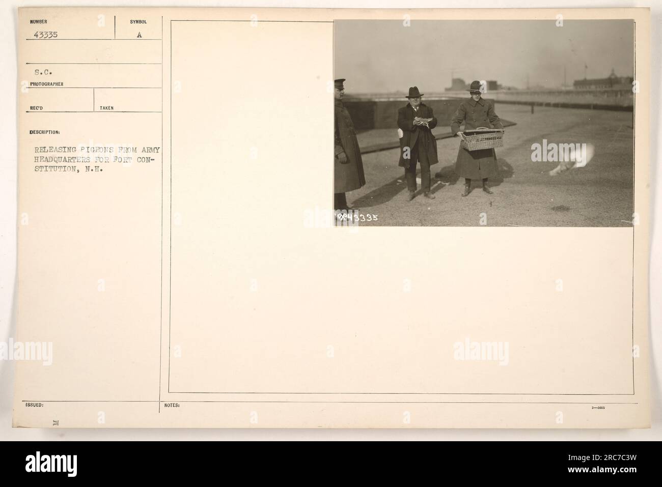 Soldiers are seen releasing pigeons from Army Headquarters at Fort ...