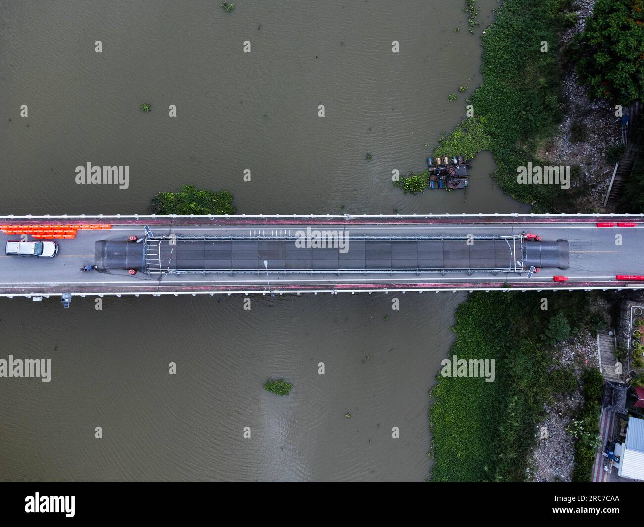 Repair of a concrete bridge across a river in the countryside. Repair ...