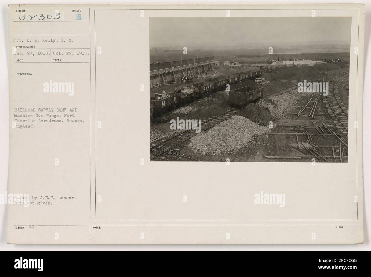 Soldier standing next to a supply dump and machine gun range at Ford ...