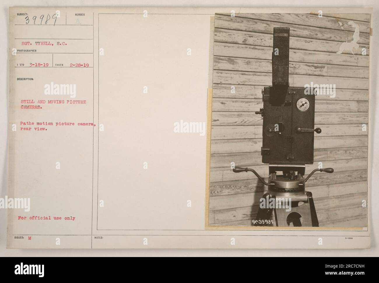 An image of a Pathe motion picture camera, viewed from the rear. This ...