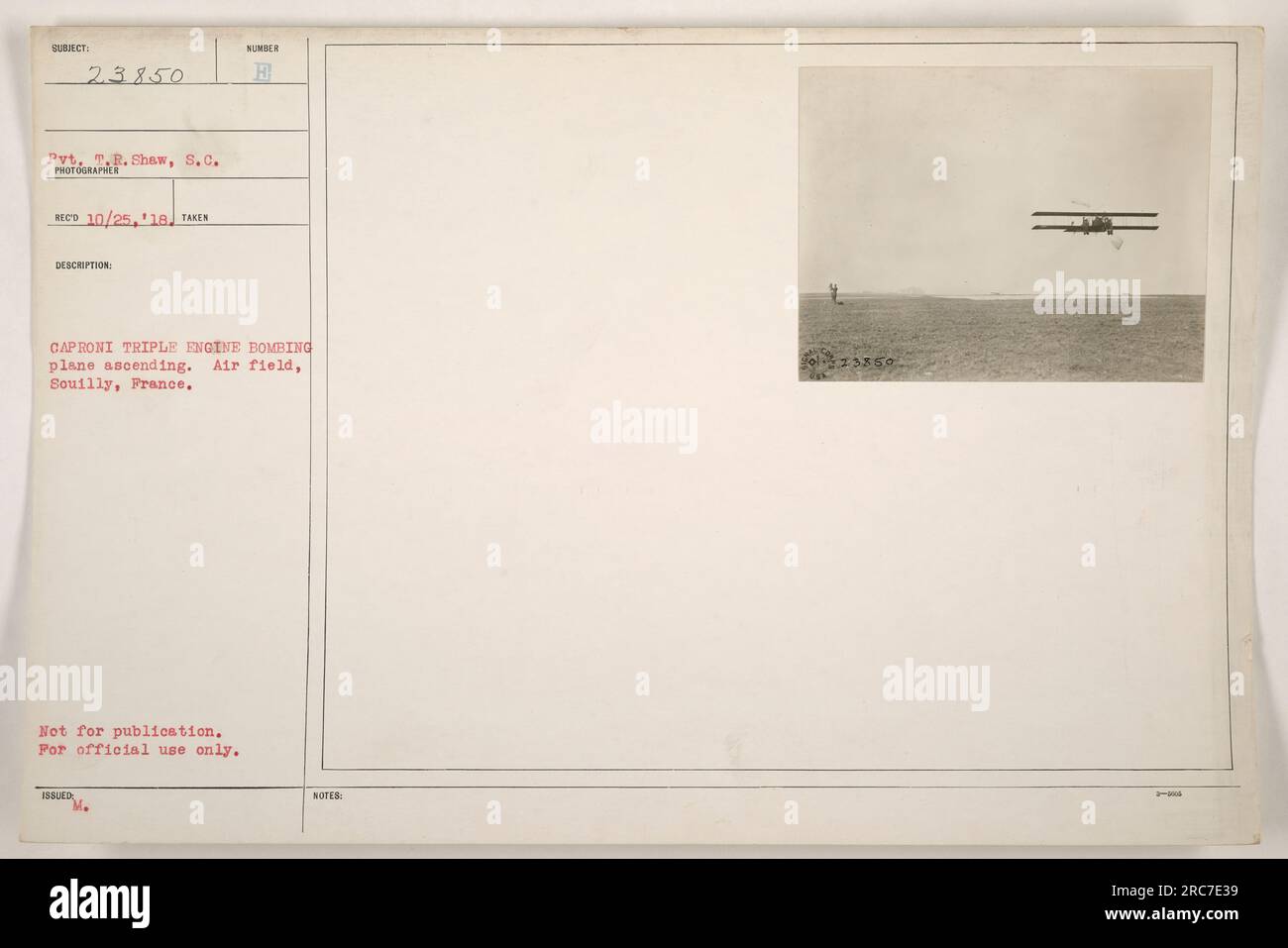 Pvt. T.R. Shaw of the Signal Corps is seen capturing an image of a ...