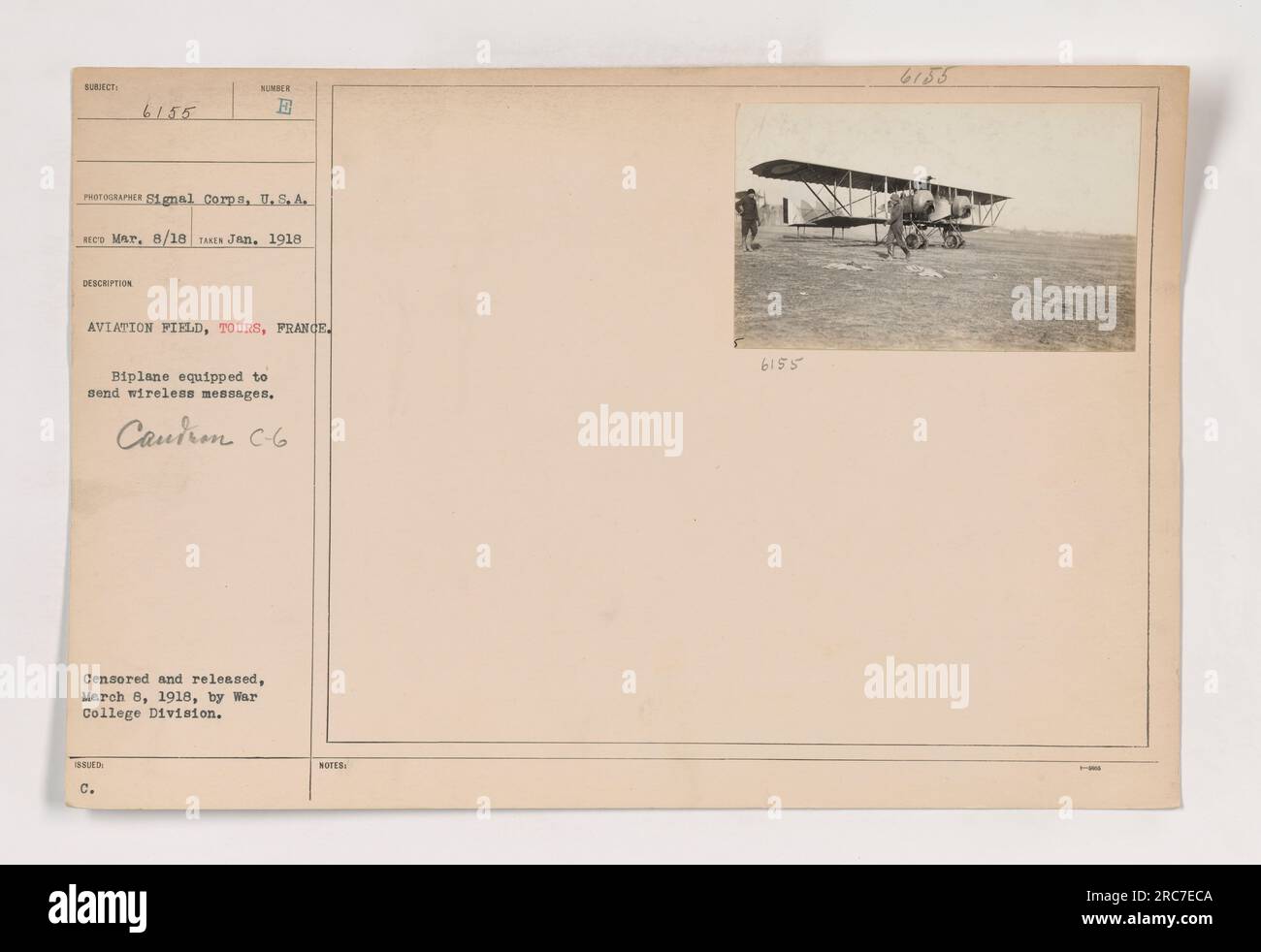 A Caudron C-6 biplane equipped with wireless communication capabilities ...