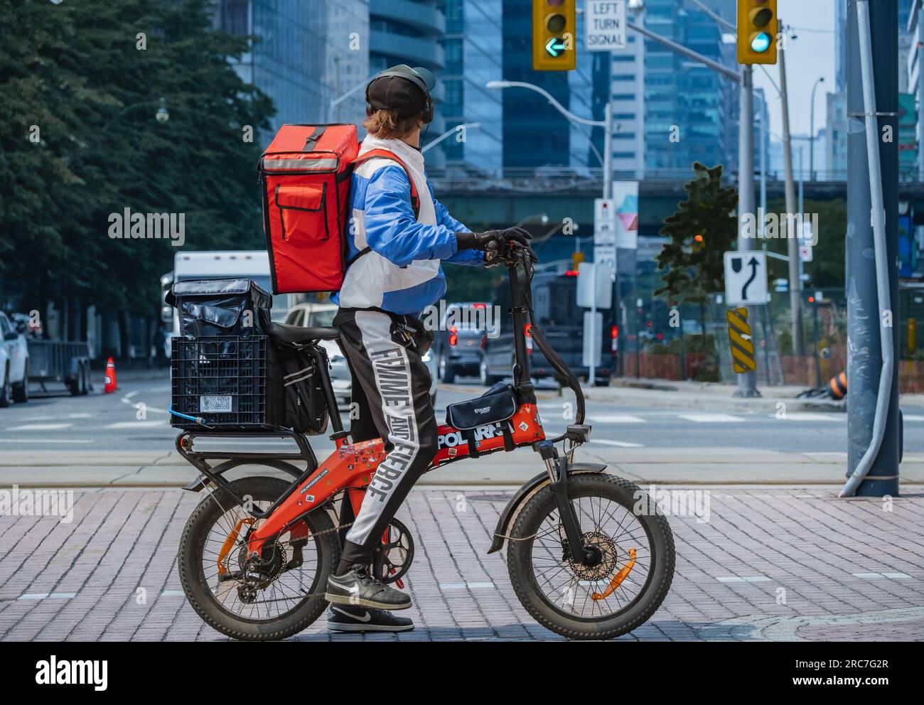 Food delivery guy delivering food with a bicycle. Delivery boy cycling ...