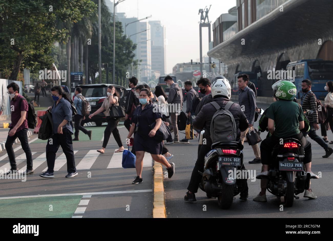 Jakarta, Indonesia - Oct 08, 2023 : people crossing the road at the ...