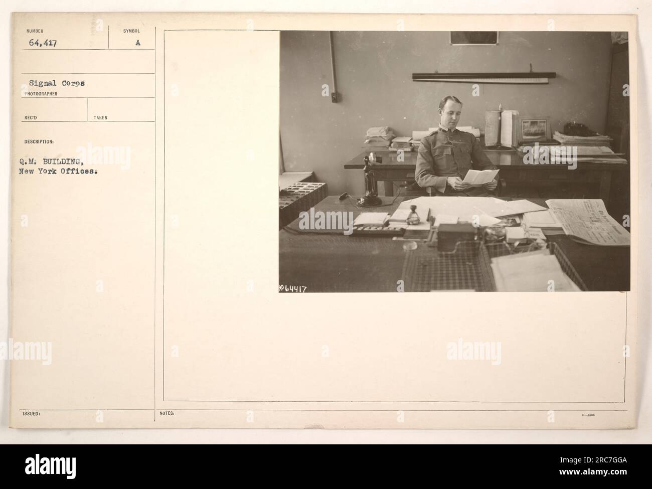 Caption: This photograph captures the building known as Q.M ...