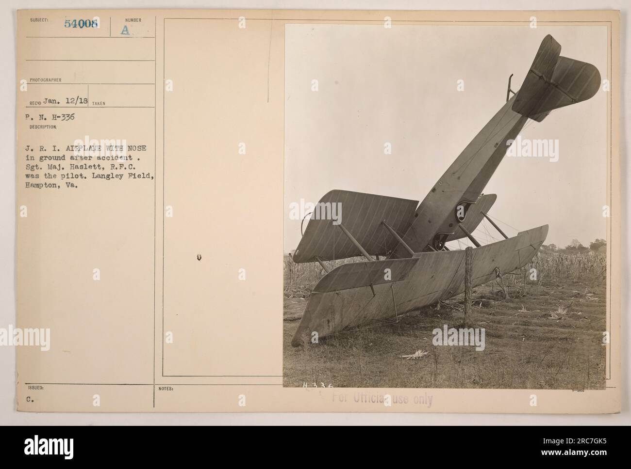 Caption: J.R.I. Airplane with nose in ground after accident at Langley ...