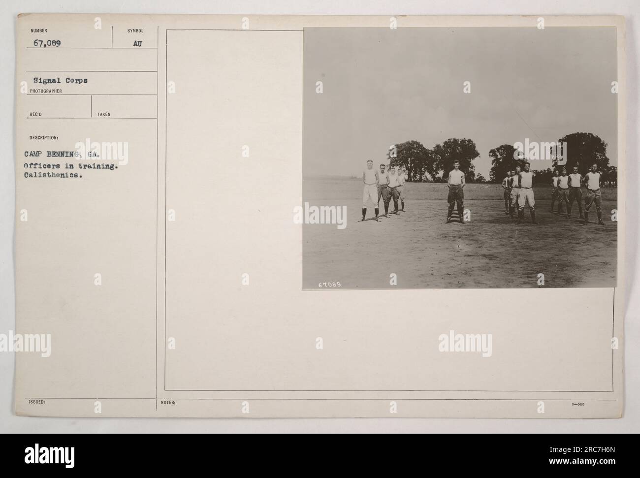 Officers in training at Camp Benning, Georgia, engaging in calisthenics ...