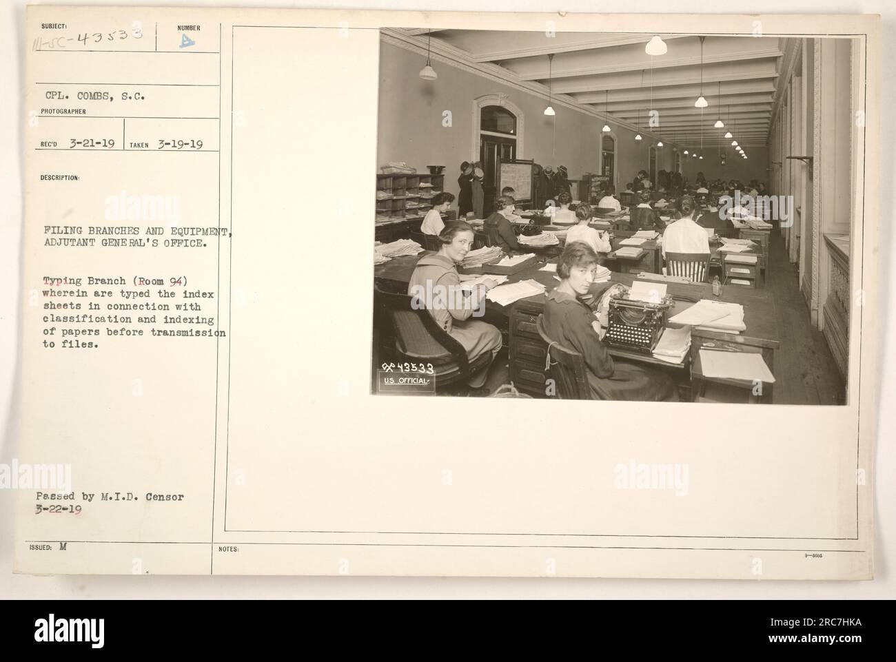 Soldier piles branches and equipment in the Typing Branch (Room 94) of ...