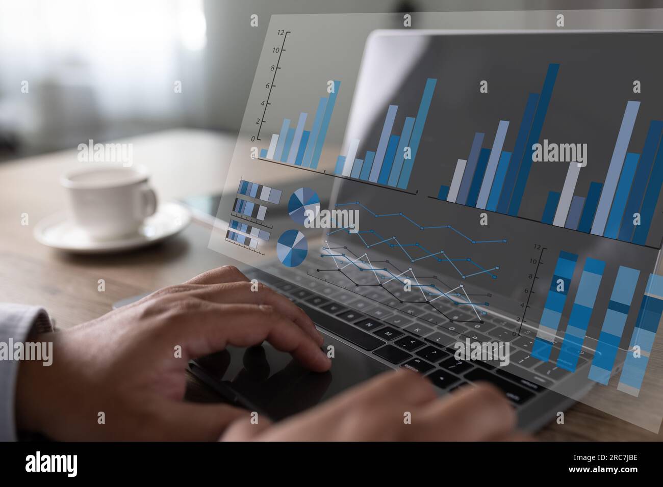analyzing on a laptop Showing business analytics dashboard technology ...