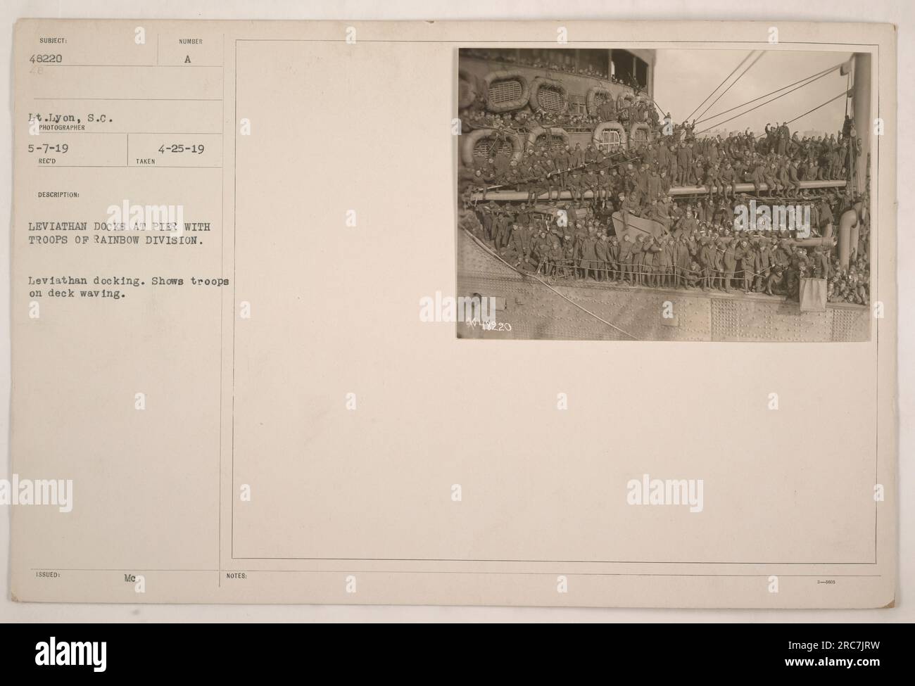 The image depicts the Leviathan docking at a pier with troops of the ...