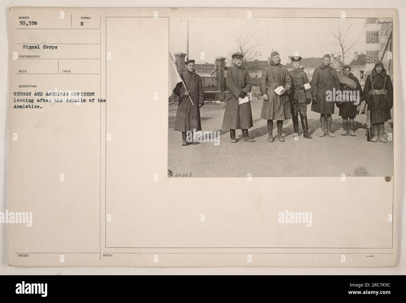 German and American officers conducting negotiations and coordinating ...