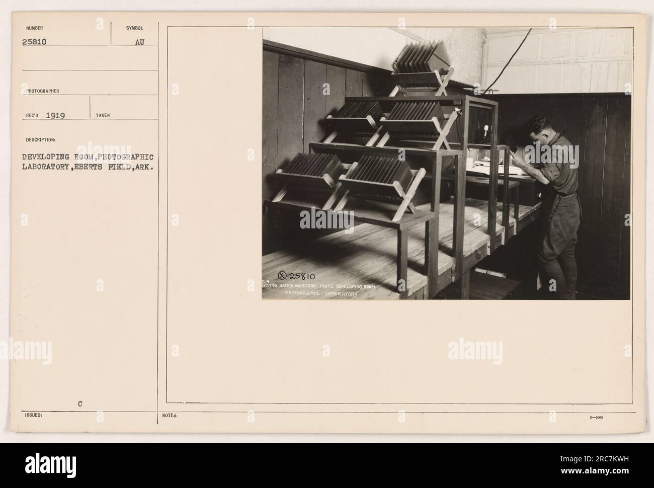 A black and white photograph showing the developing room of a ...