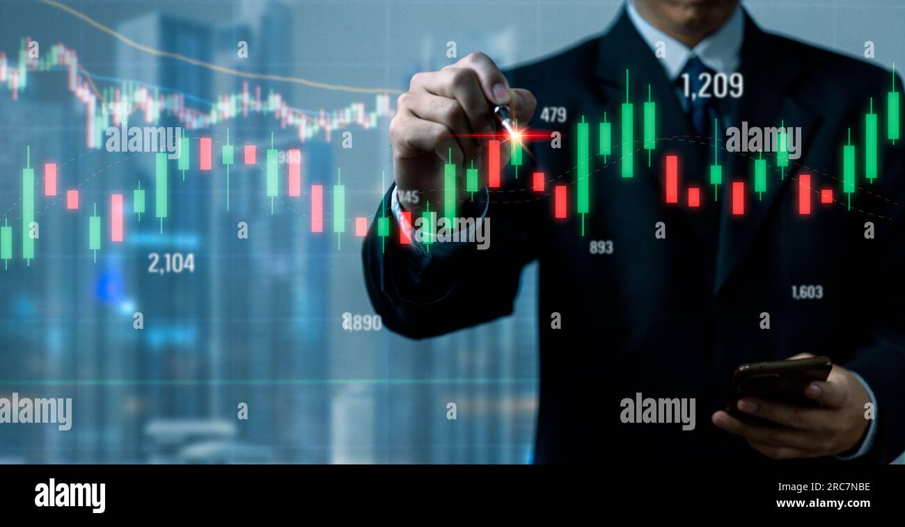 Businessman analysis graph stock market and financial , investment ...