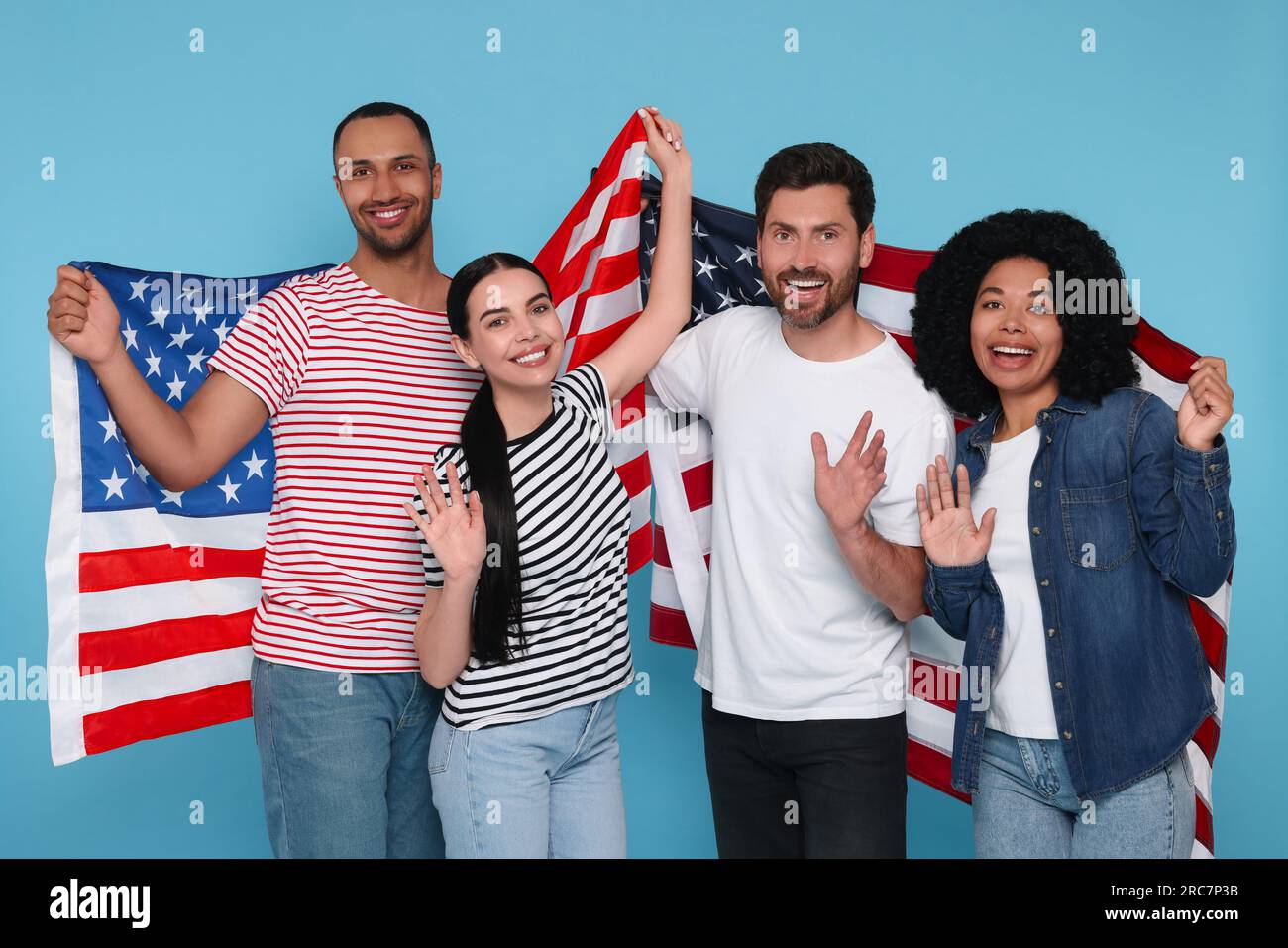 Young adult friends greeting usa hi-res stock photography and images ...