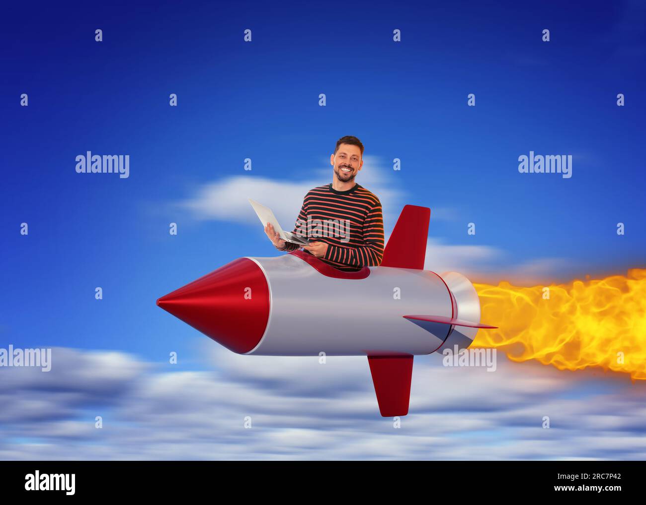 Rapid success. Happy man with laptop in rocket rushing through sky ...