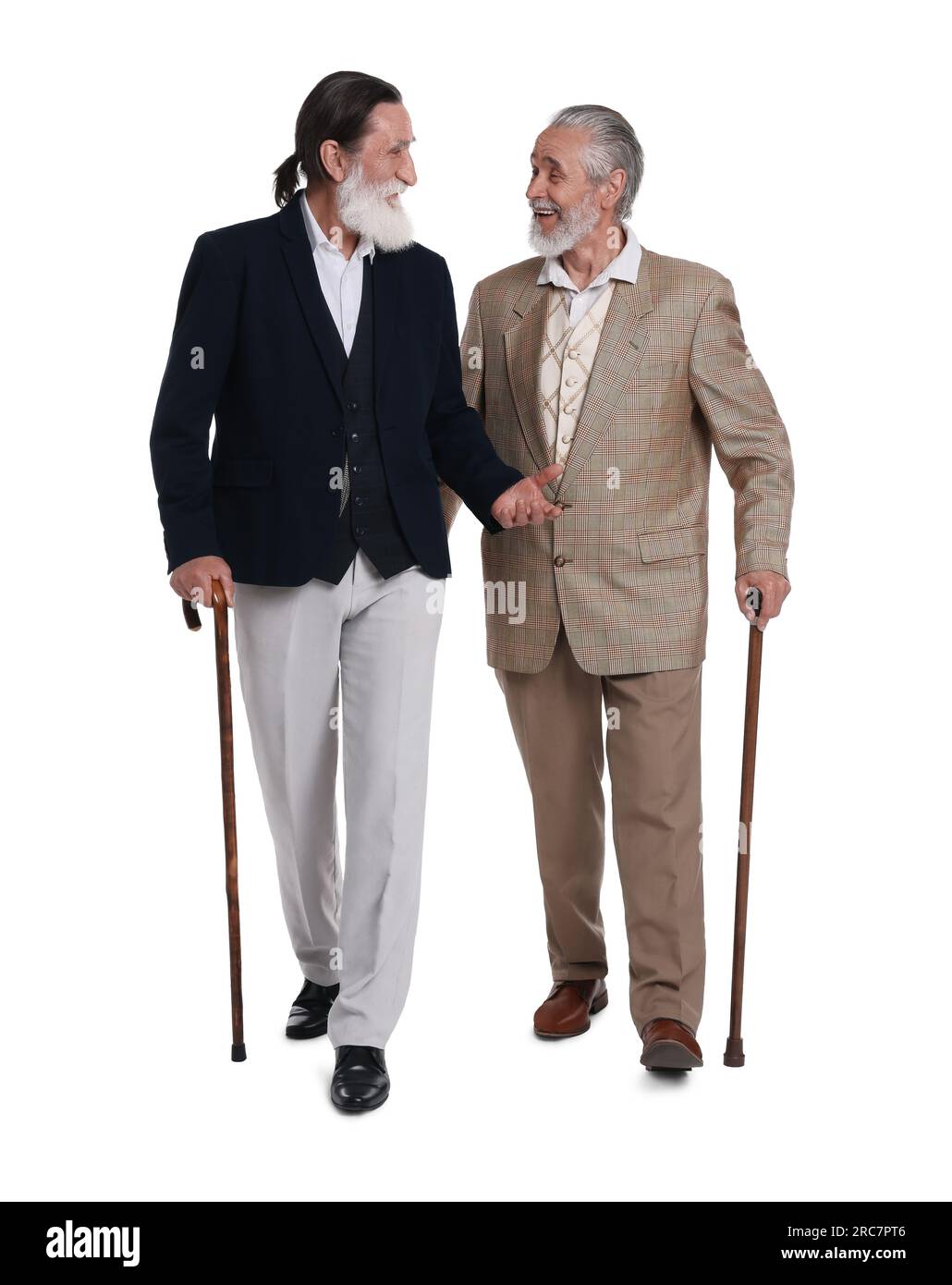 Senior men with walking canes on white background Stock Photo - Alamy