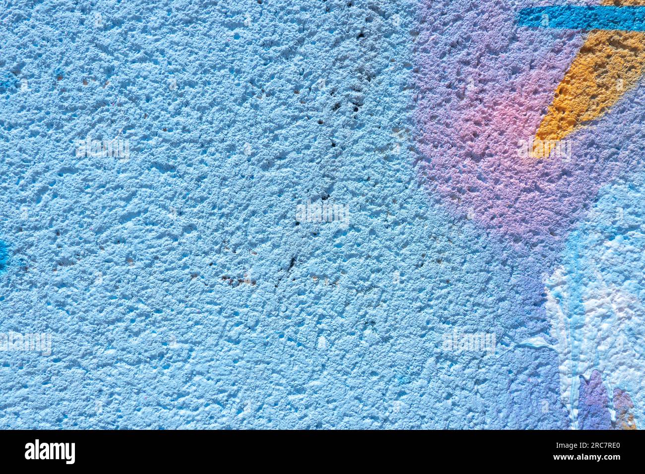 Messy paint strokes and smudges on light blue grunge painted wall ...