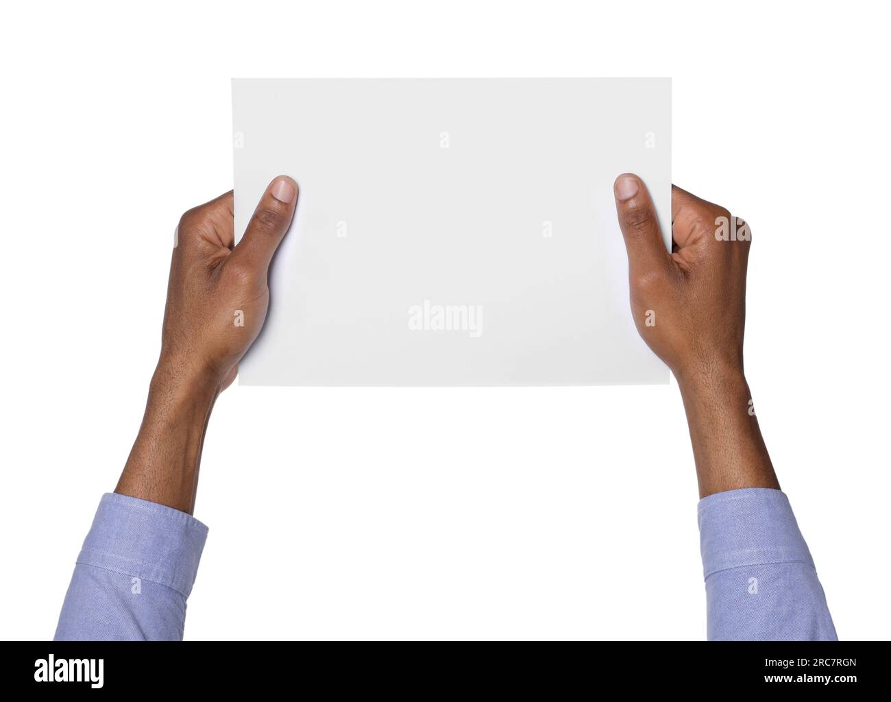 African American man holding sheet of paper on white background ...