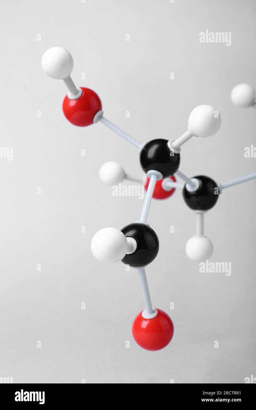 Molecule of glucose on light grey background, closeup. Chemical model ...