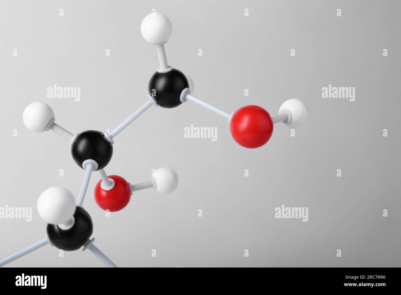 Molecule of glucose on light grey background, closeup. Chemical model ...