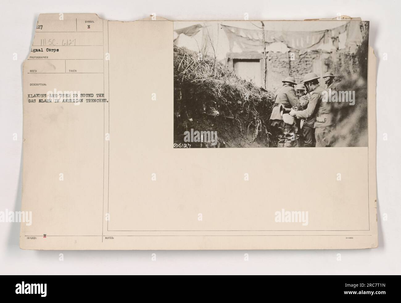 Klaxons are used to sound gas alarms in American trenches during World ...