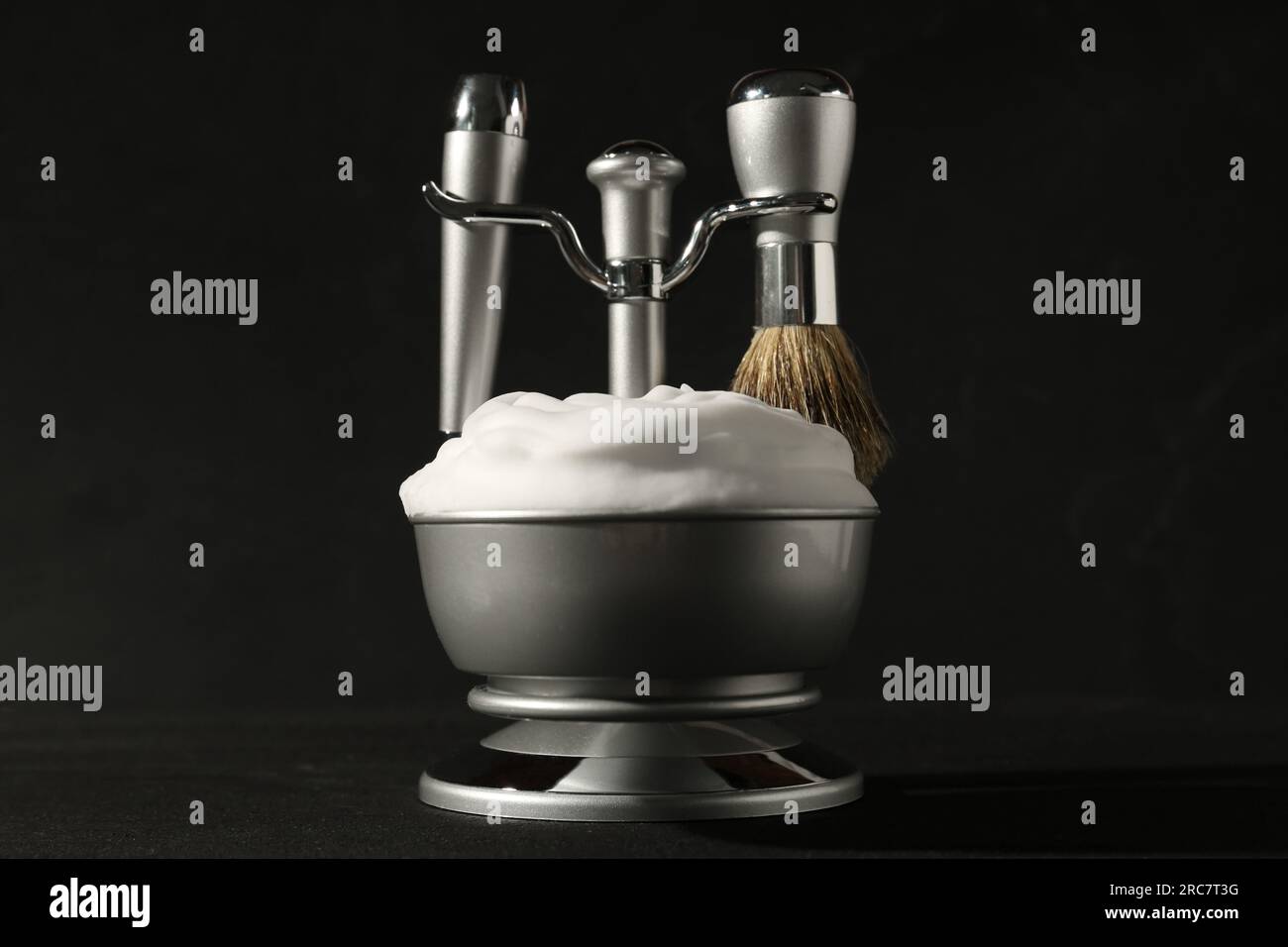 Set of men's shaving tools and foam on black background Stock Photo - Alamy