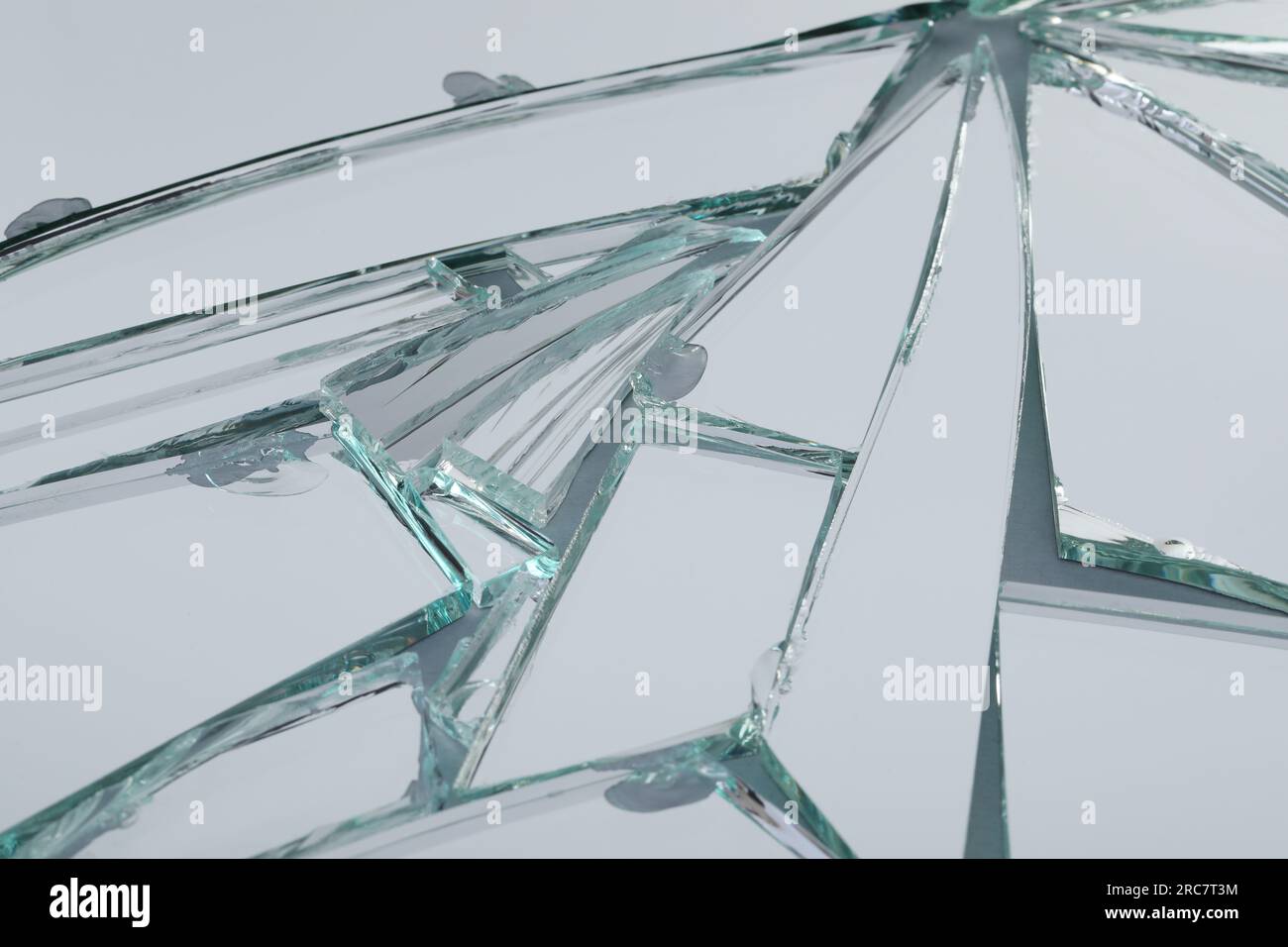 Broken mirror with many cracks as background, closeup view Stock Photo ...